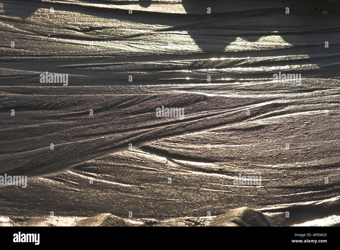 Mysterious patterns in sand on beach Stock Photo - Alamy