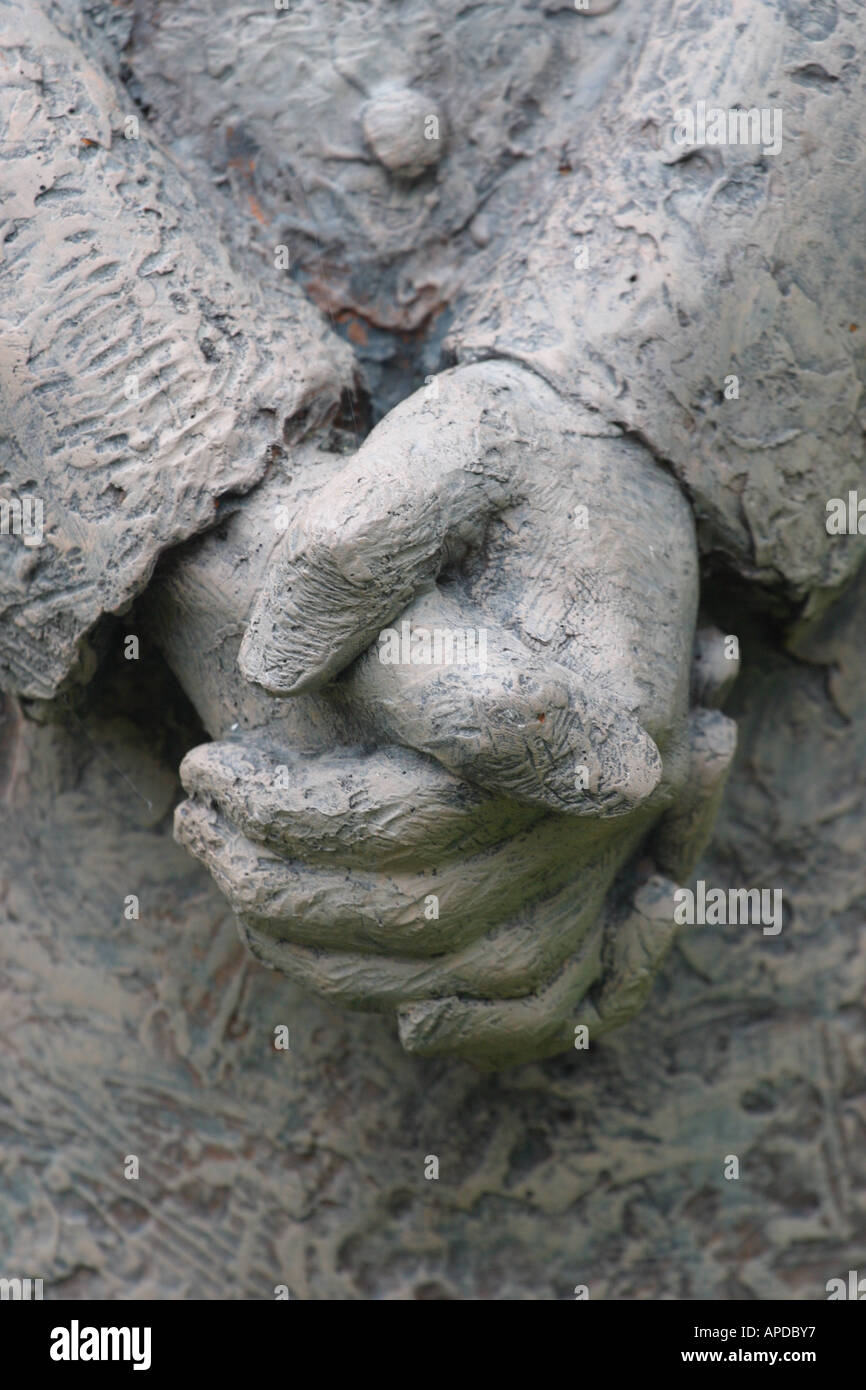 Hands clasped together Stock Photo - Alamy