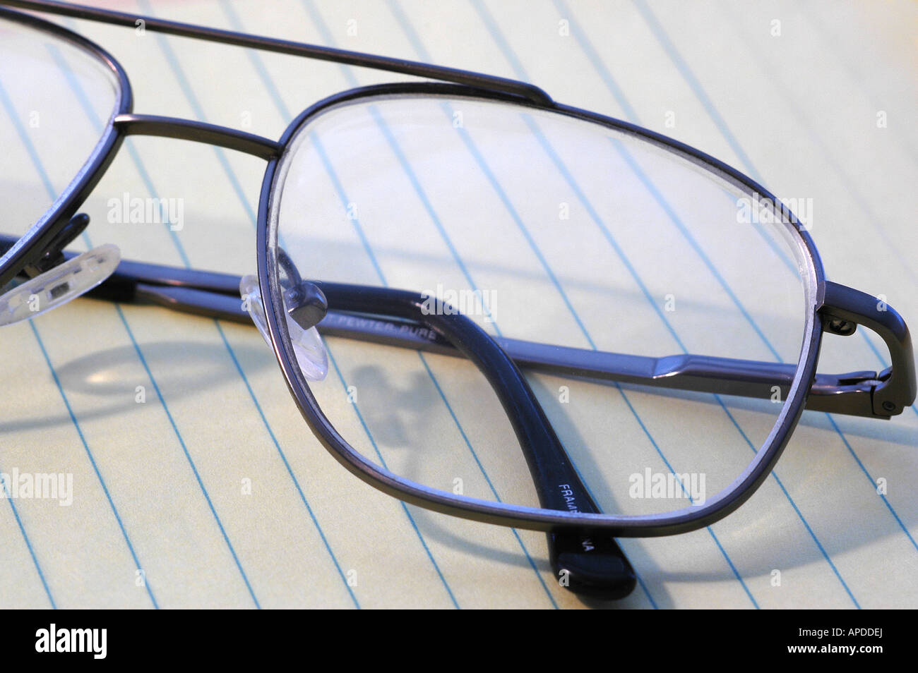Glasses and Writing Tablet Stock Photo - Alamy