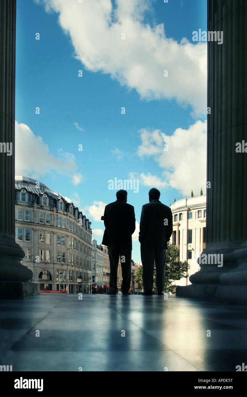 two people stood at the entrance to St Pauls Stock Photo - Alamy