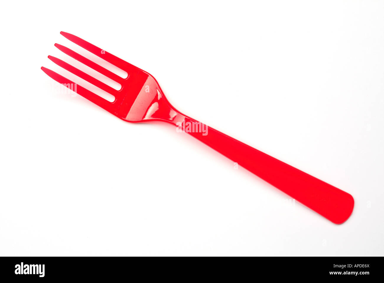a red fork made of plastic Stock Photo - Alamy
