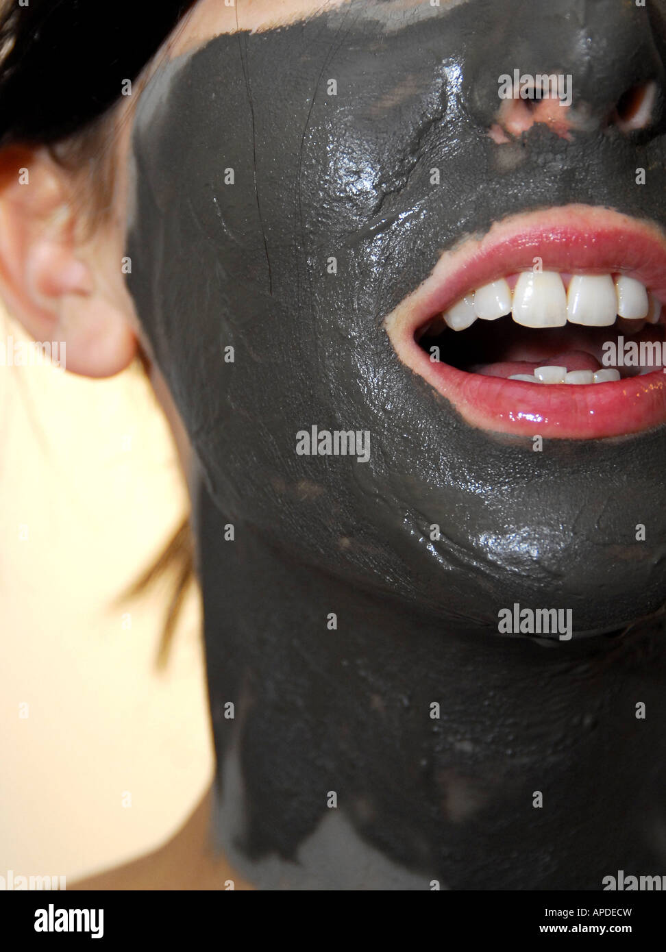 Mud face mask Stock Photo - Alamy