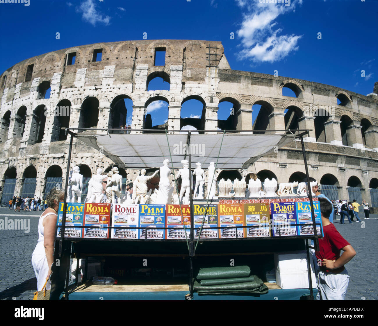 Book stall with tourist guides and statues on Rome in front of the ...
