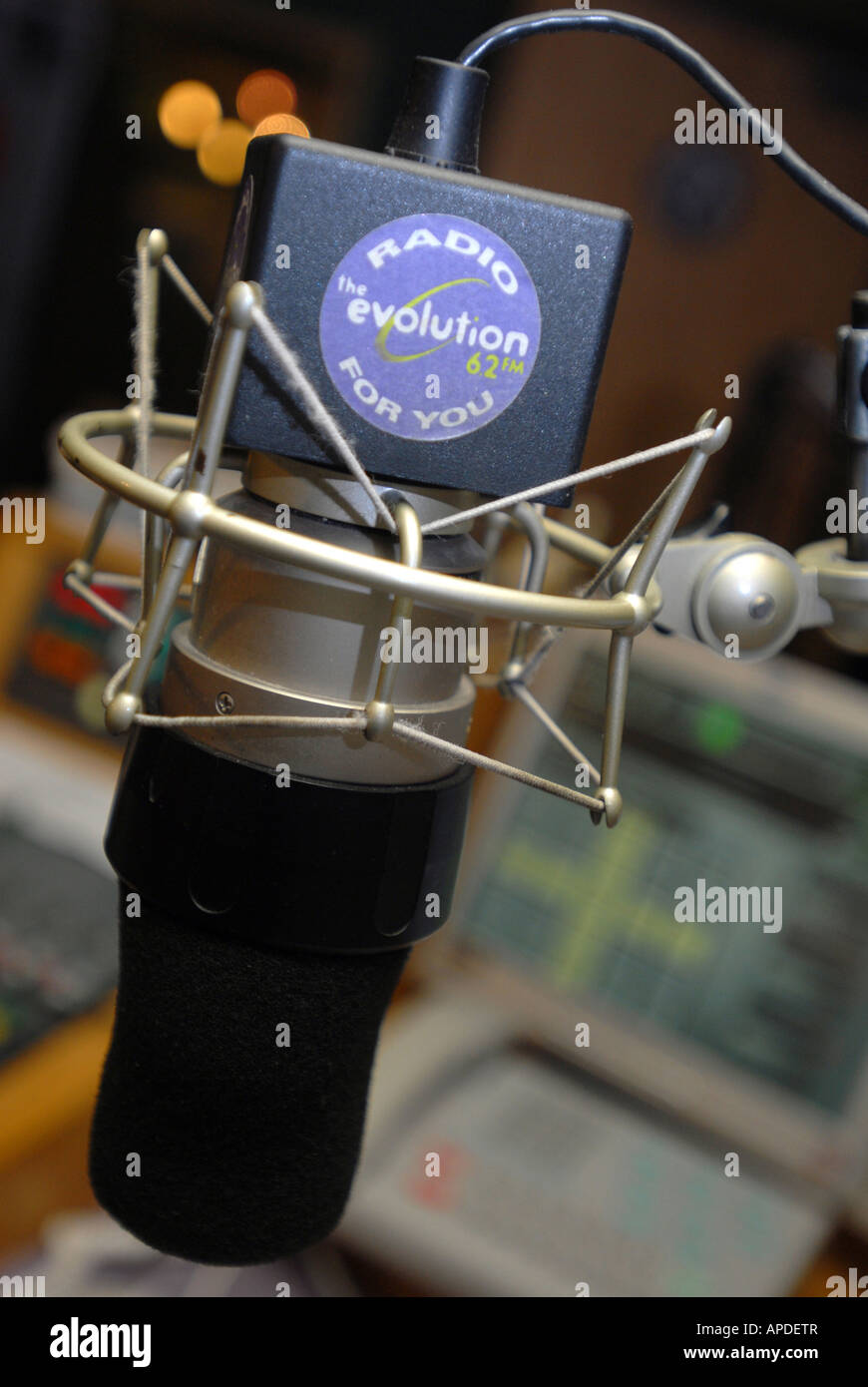a dj microphone at a radio station mixing desk Stock Photo - Alamy