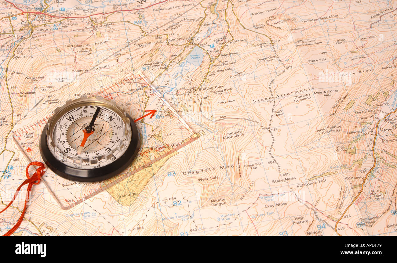 Close up of walking map and compass Stock Photo - Alamy