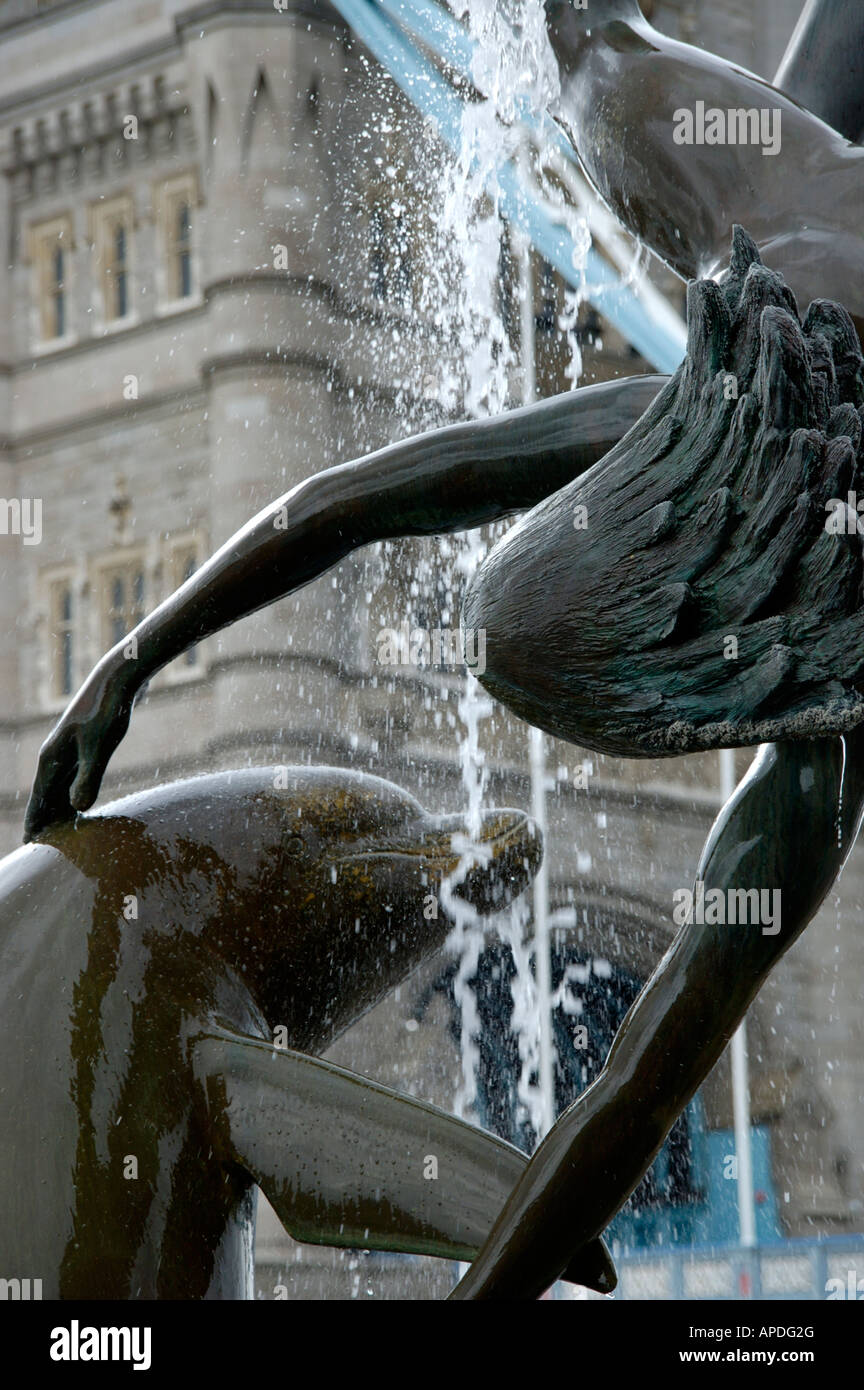 Girl With A Dolphin statue near Tower Bridge, London Stock Photo - Alamy