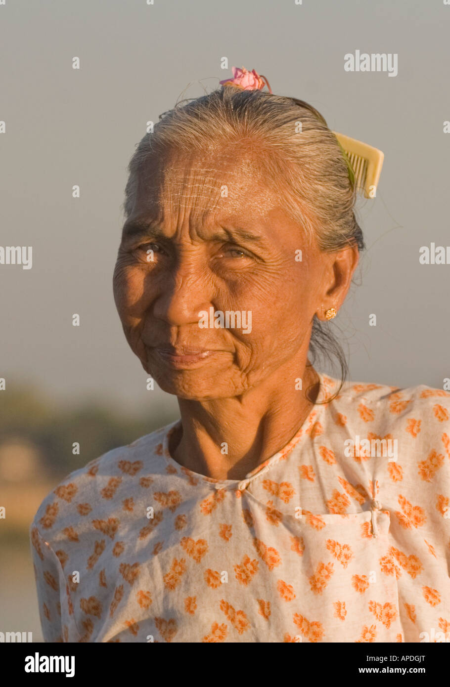 Burmese Old Woman crossing the U Bein Bridge near Mandalay Myanmar ...