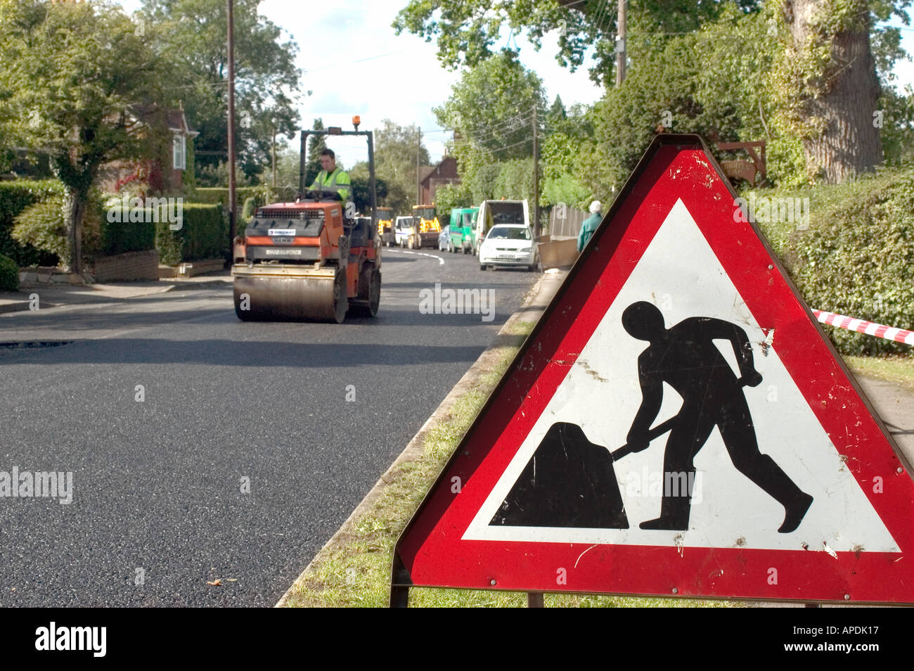 Sign Men at Work Stock Photo - Alamy