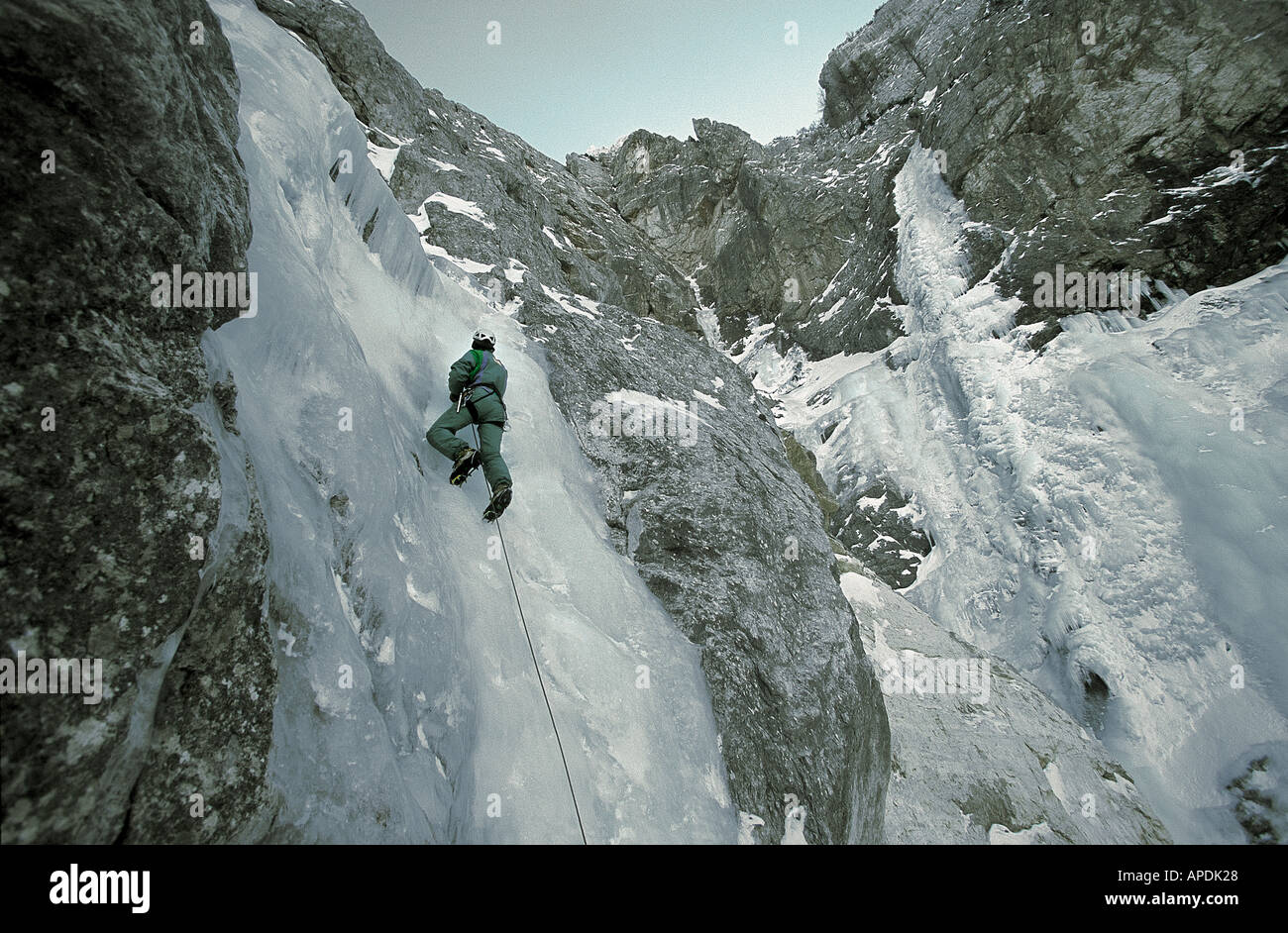 Alpinist Tomo Cesen climbing on Levi slap, classical icefall in ...