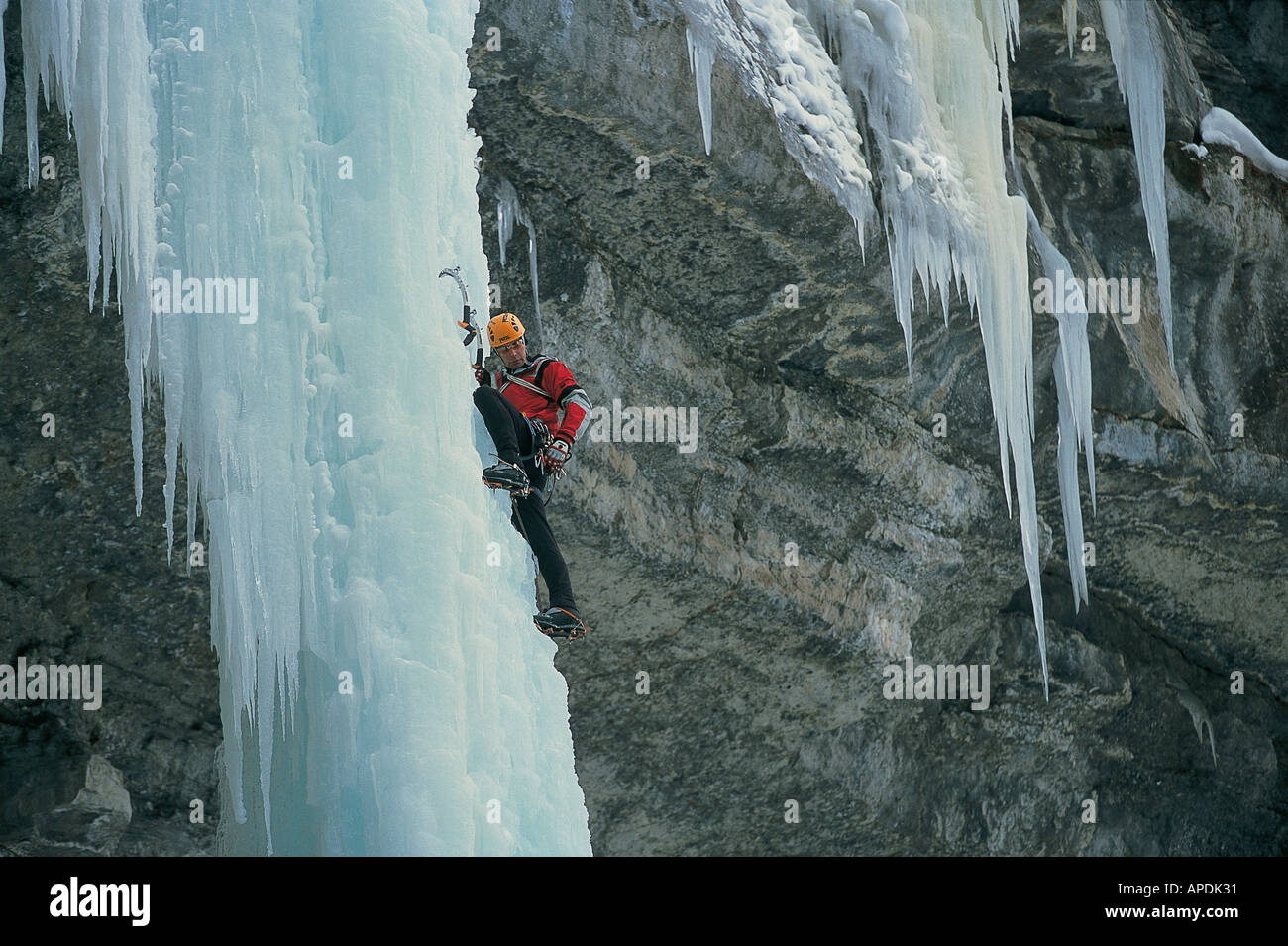 Ice climber Aljaz Anderle climbing on Rigid Designator, classical icefall in Vail, Colorado, USA ...