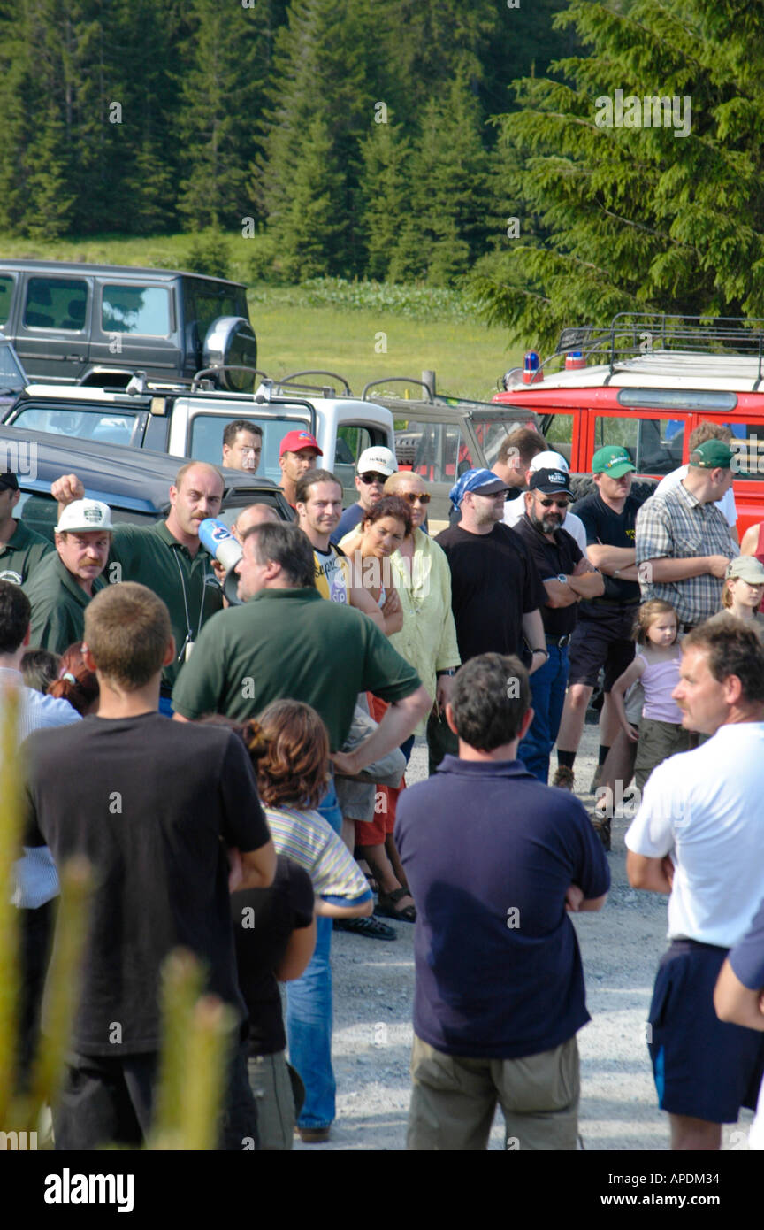 Various Land Rover and people at an off roading event in the Austrian ...