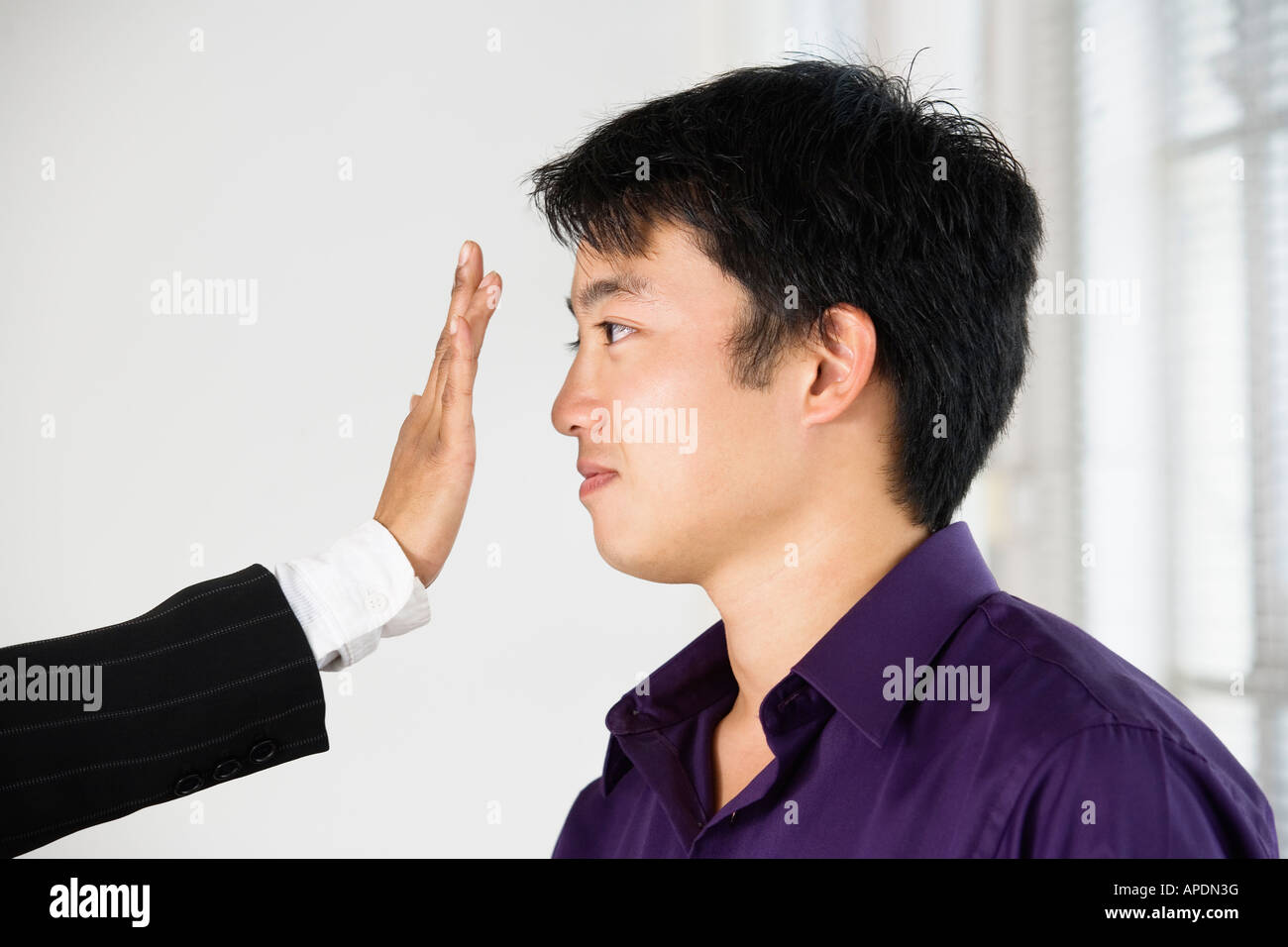Hands stopping man High Resolution Stock Photography and Images - Alamy