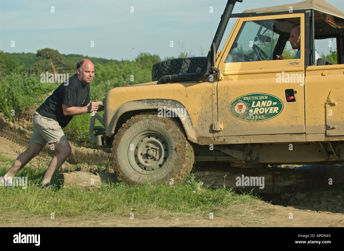 Recovering stuck land rover defender hi-res stock photography and ...