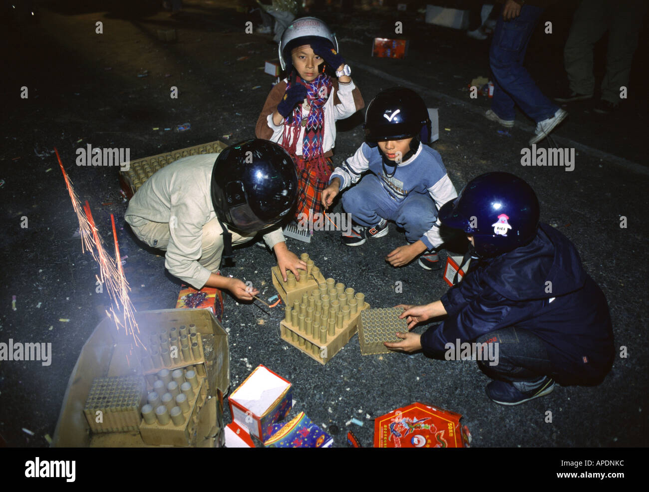 Child lighting fireworks hi-res stock photography and images - Alamy