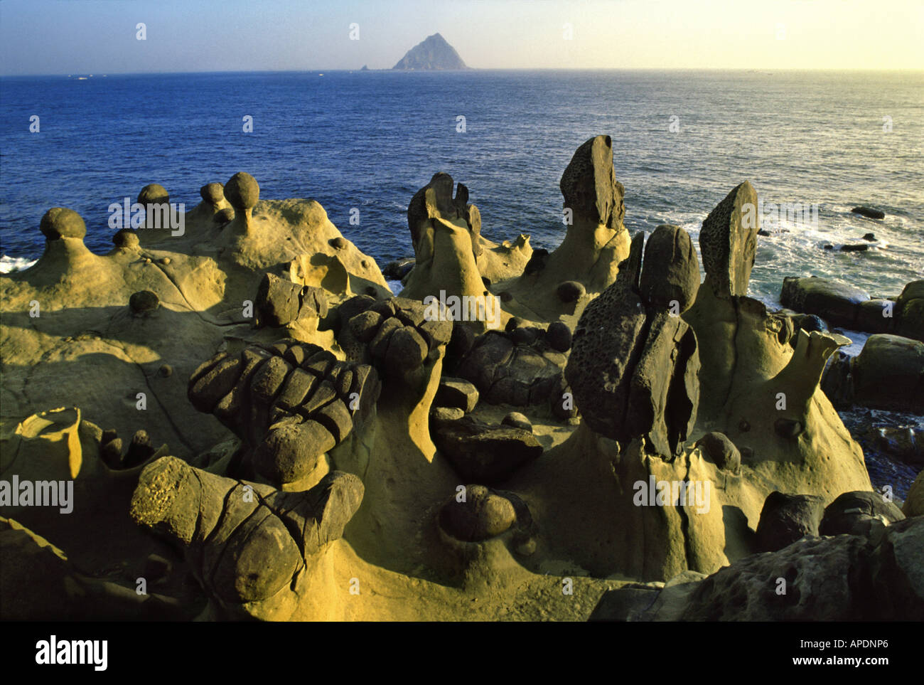 Rock formations on an island in the sunlight, Heping Island, Keelung ...