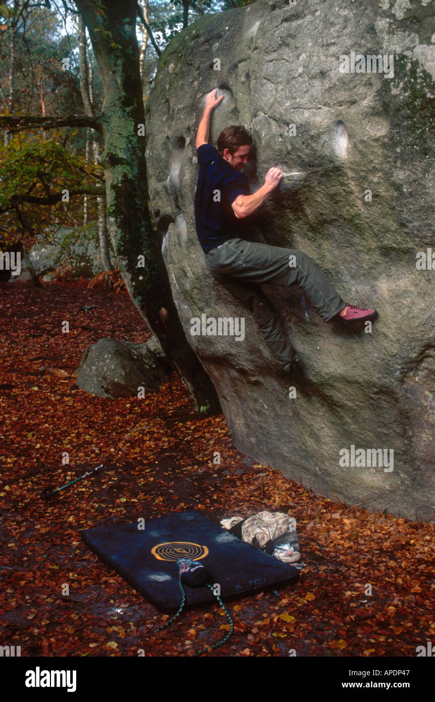 Sam Whitaker bouldering in Fontainebleau France Stock Photo - Alamy