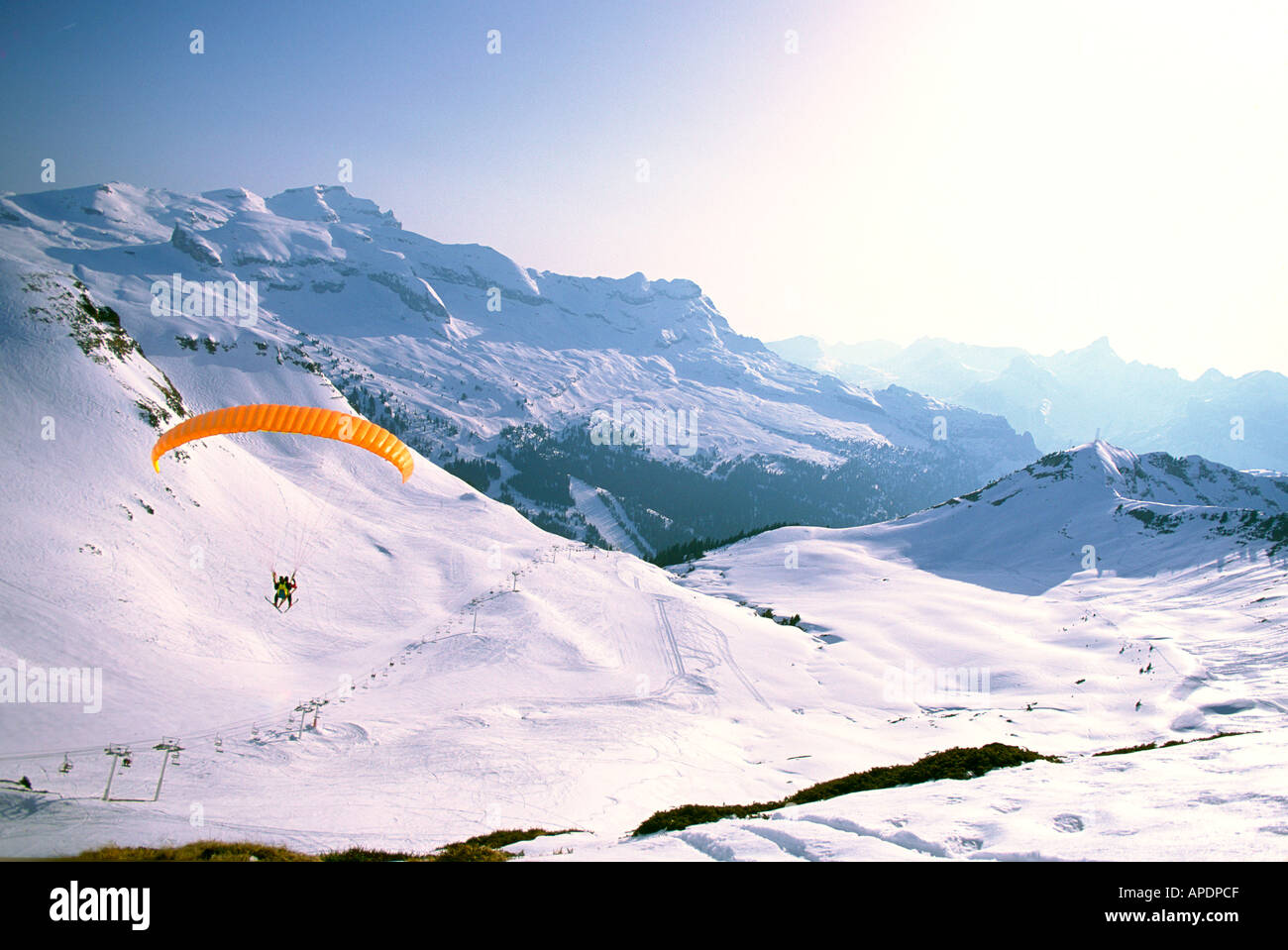 Paraglider in mountains on sunny hi-res stock photography and images ...