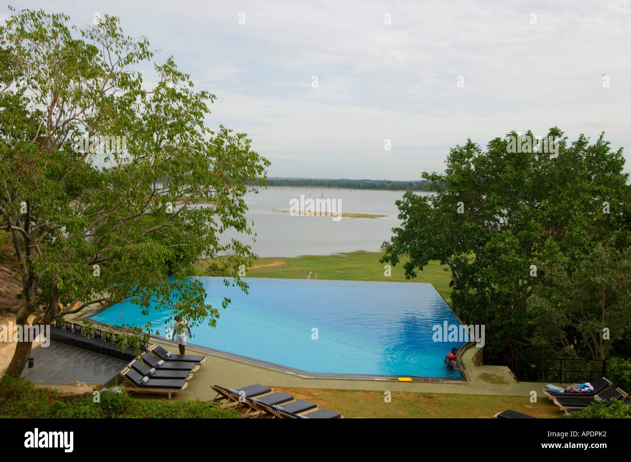 Kandalama Hotel swimming pool, looking to tank (reservoir) near ...