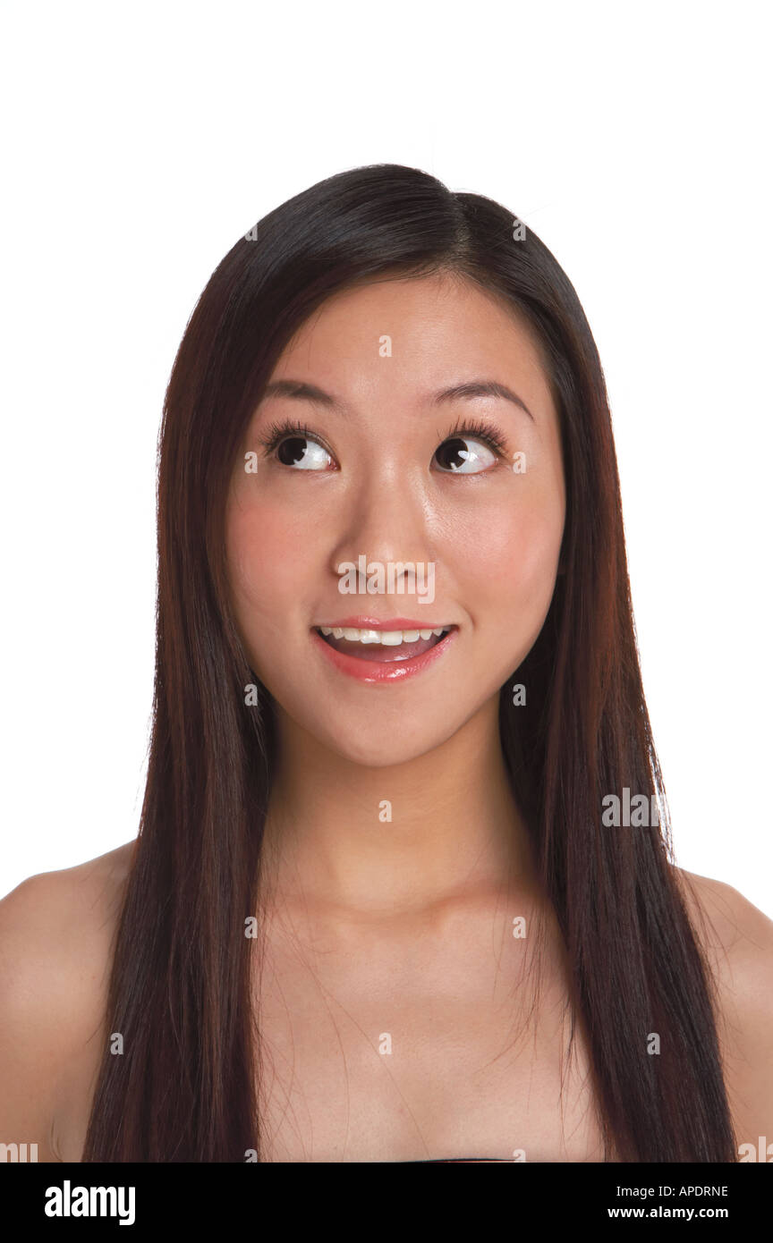 Young woman looking up and smile happily Stock Photo - Alamy