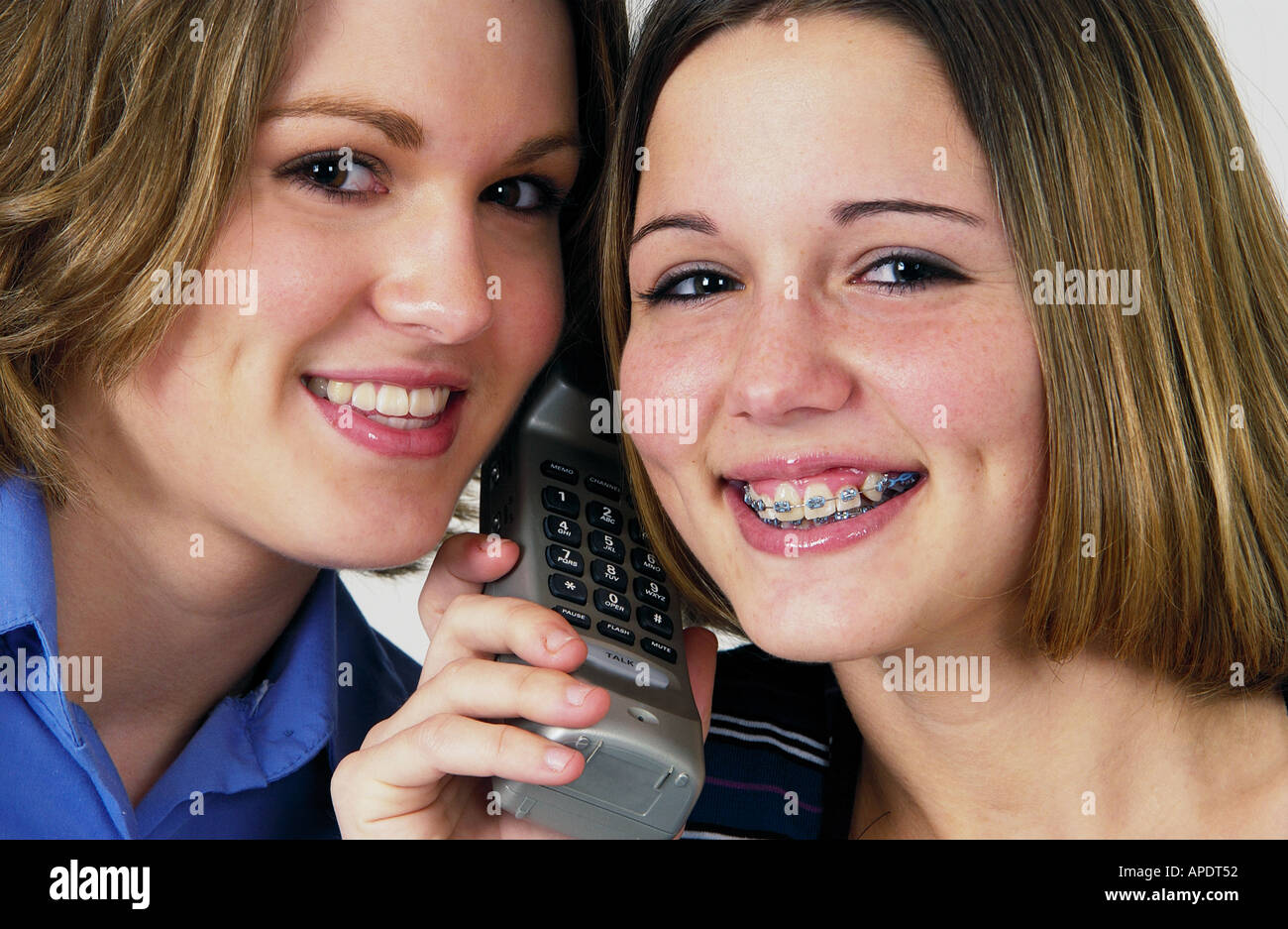 Young girls on cordless phone Stock Photo - Alamy