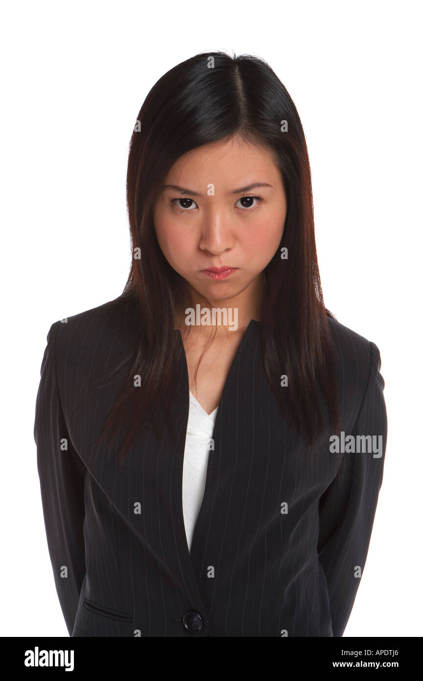 Young woman in business suit angry Stock Photo - Alamy