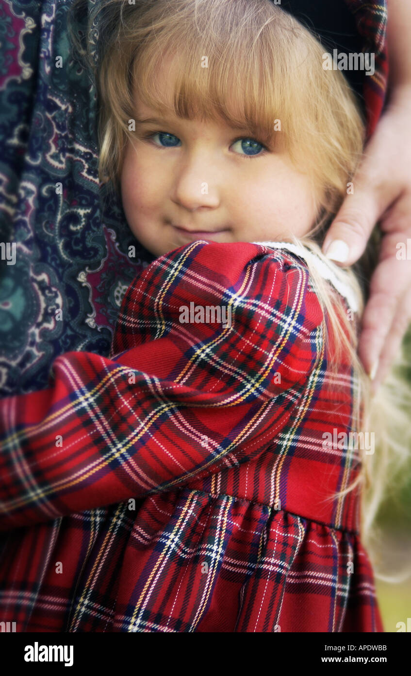 Young girl hugging mother Stock Photo - Alamy Young girl hugging mother Stock Photo - Alamy