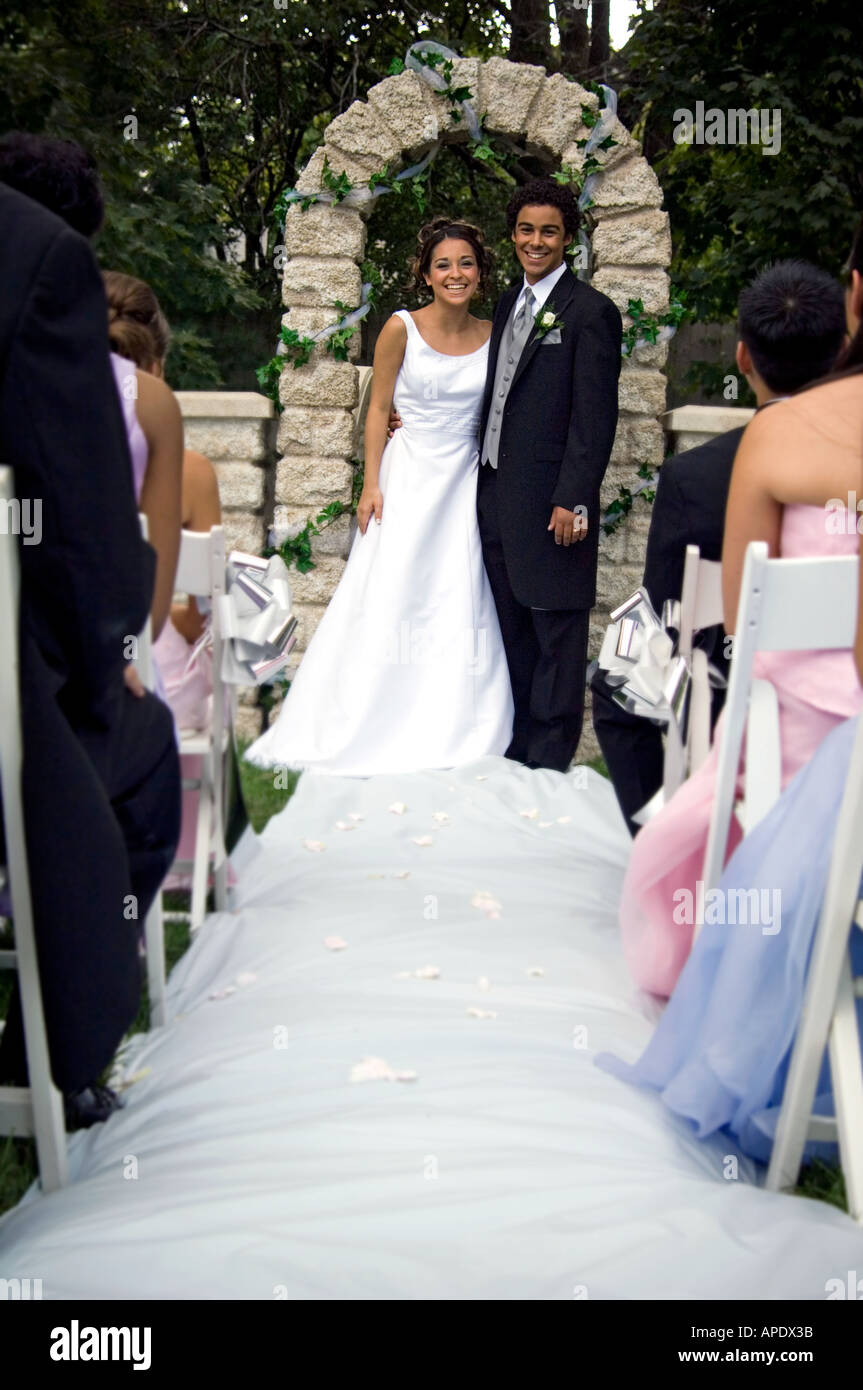 Bride and Groom at altar Stock Photo - Alamy