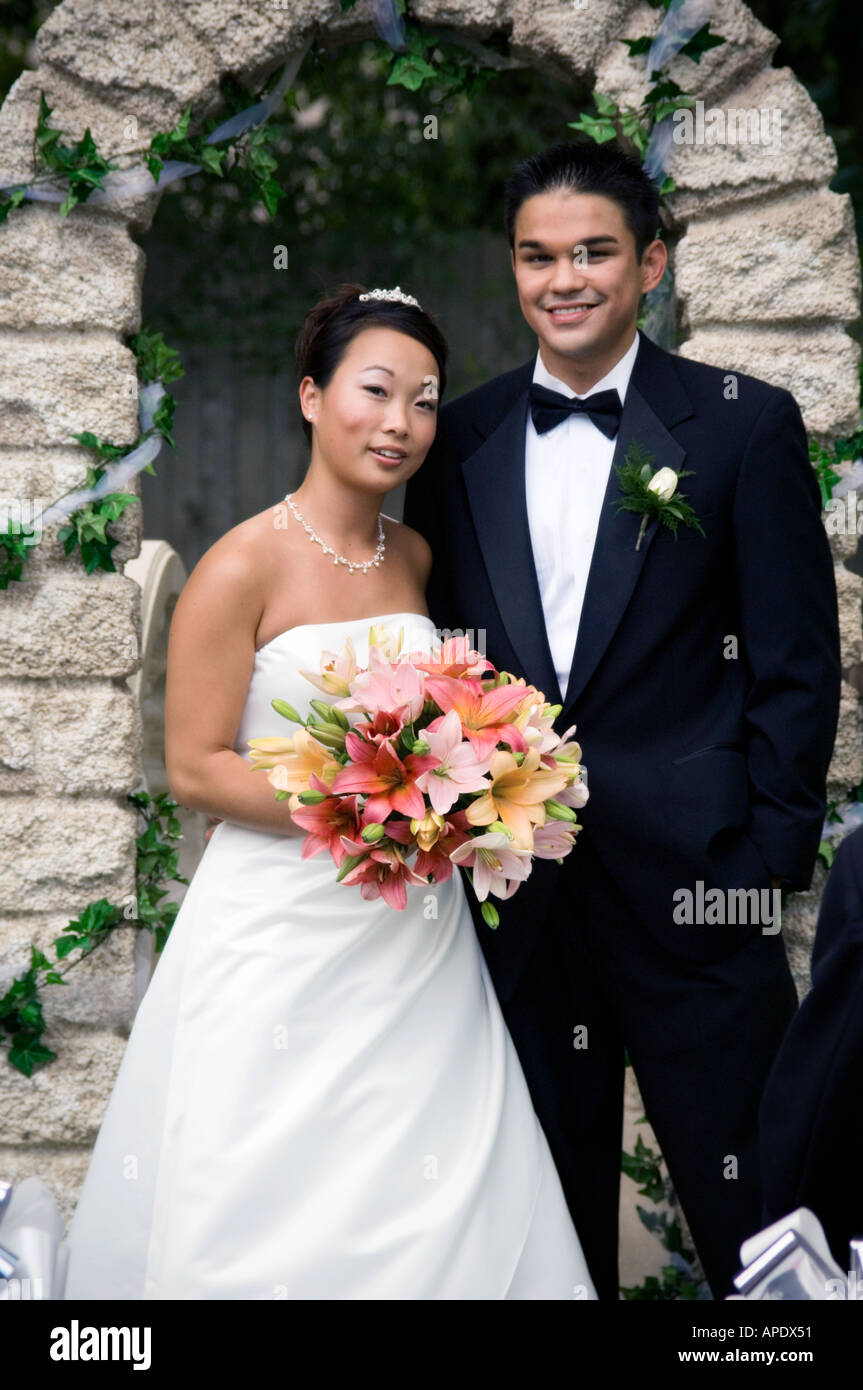 Bride and Groom at altar Stock Photo - Alamy