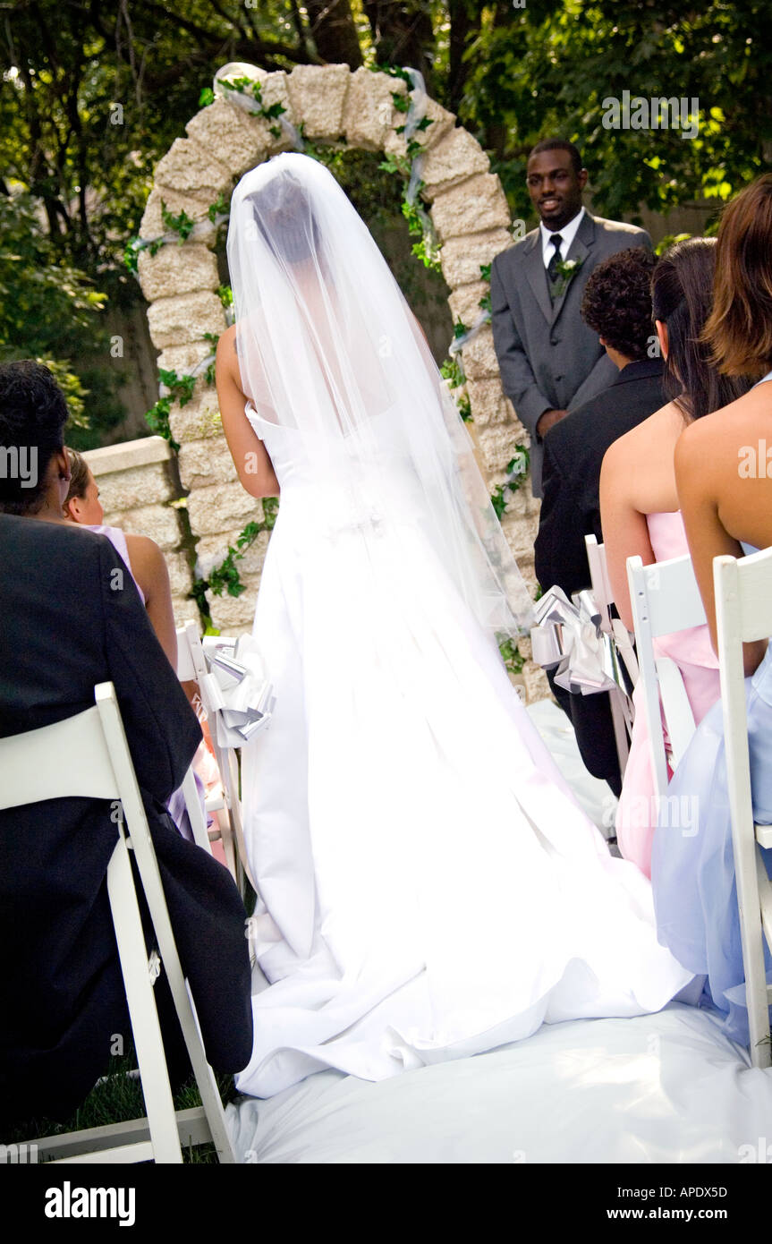 Bride walking down aisle Stock Photo - Alamy