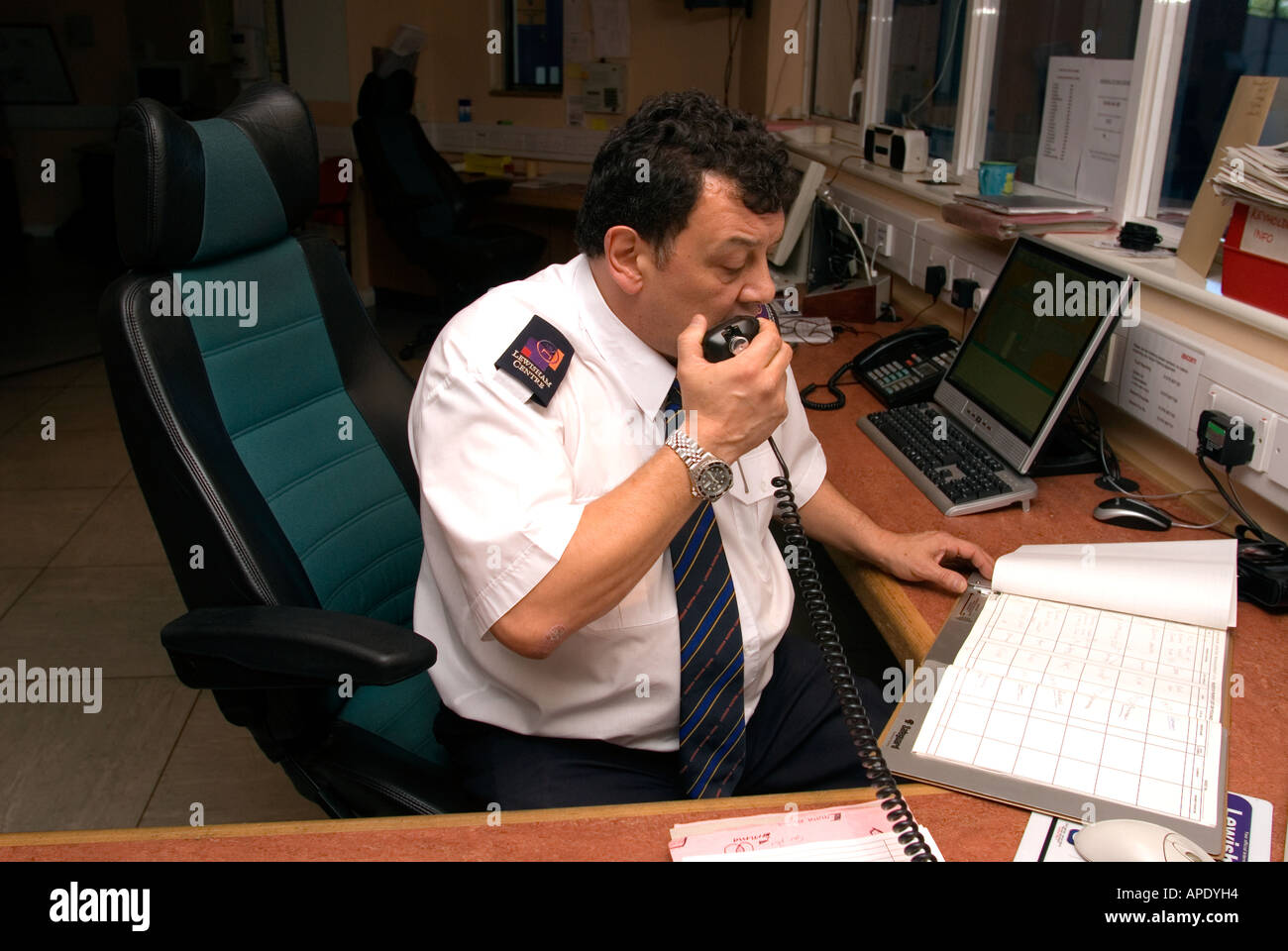 Security Guard on duty in cctv control room in Lewisham Shopping Centre ...