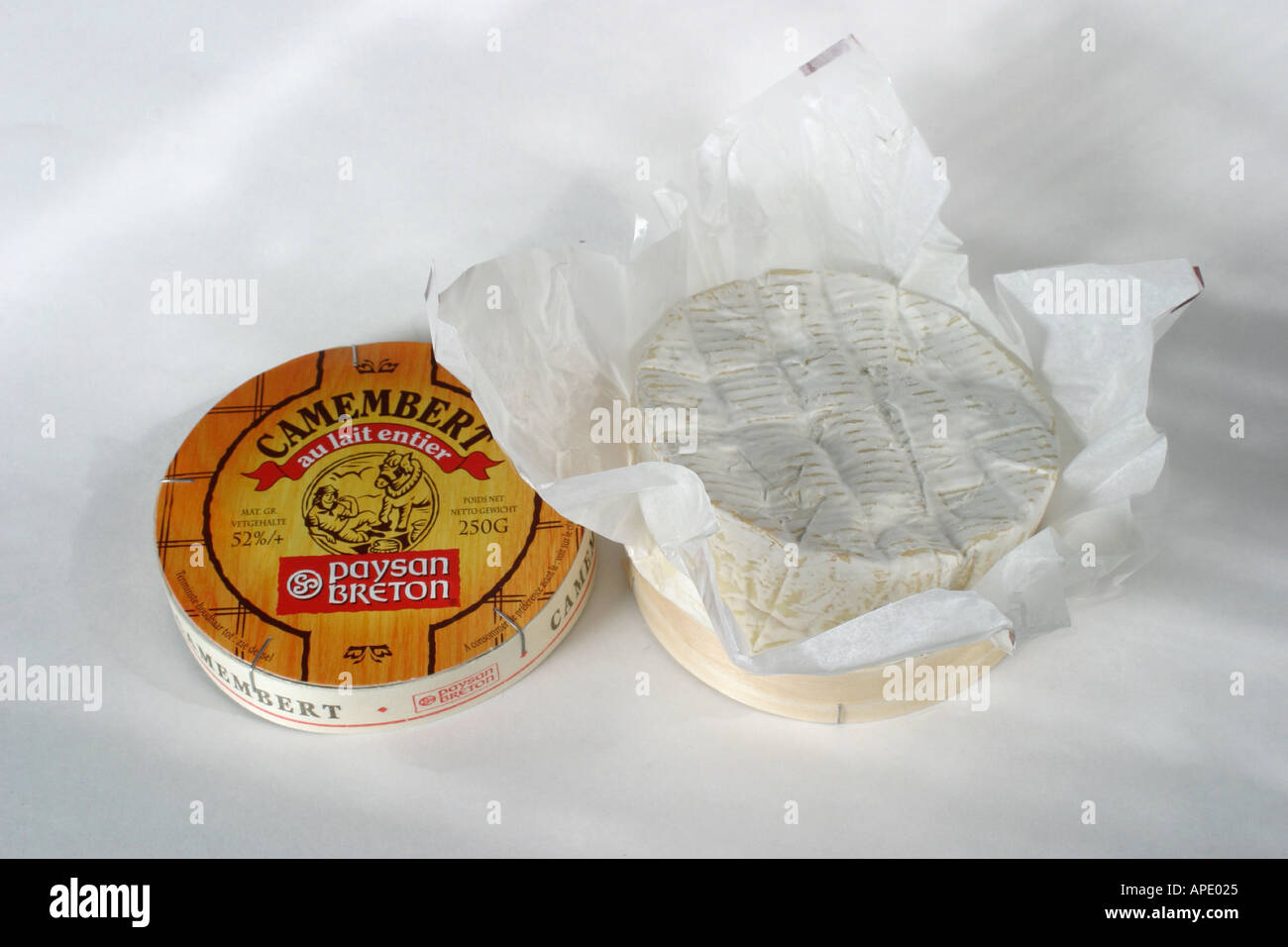 Small Camembert cheese unboxed and uncut on white background Stock ...