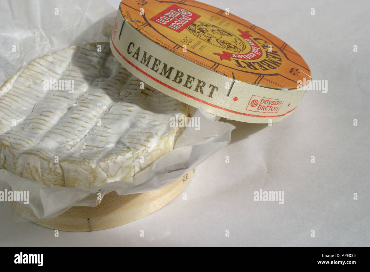 Small Camembert cheese unboxed and uncut on white background Stock ...