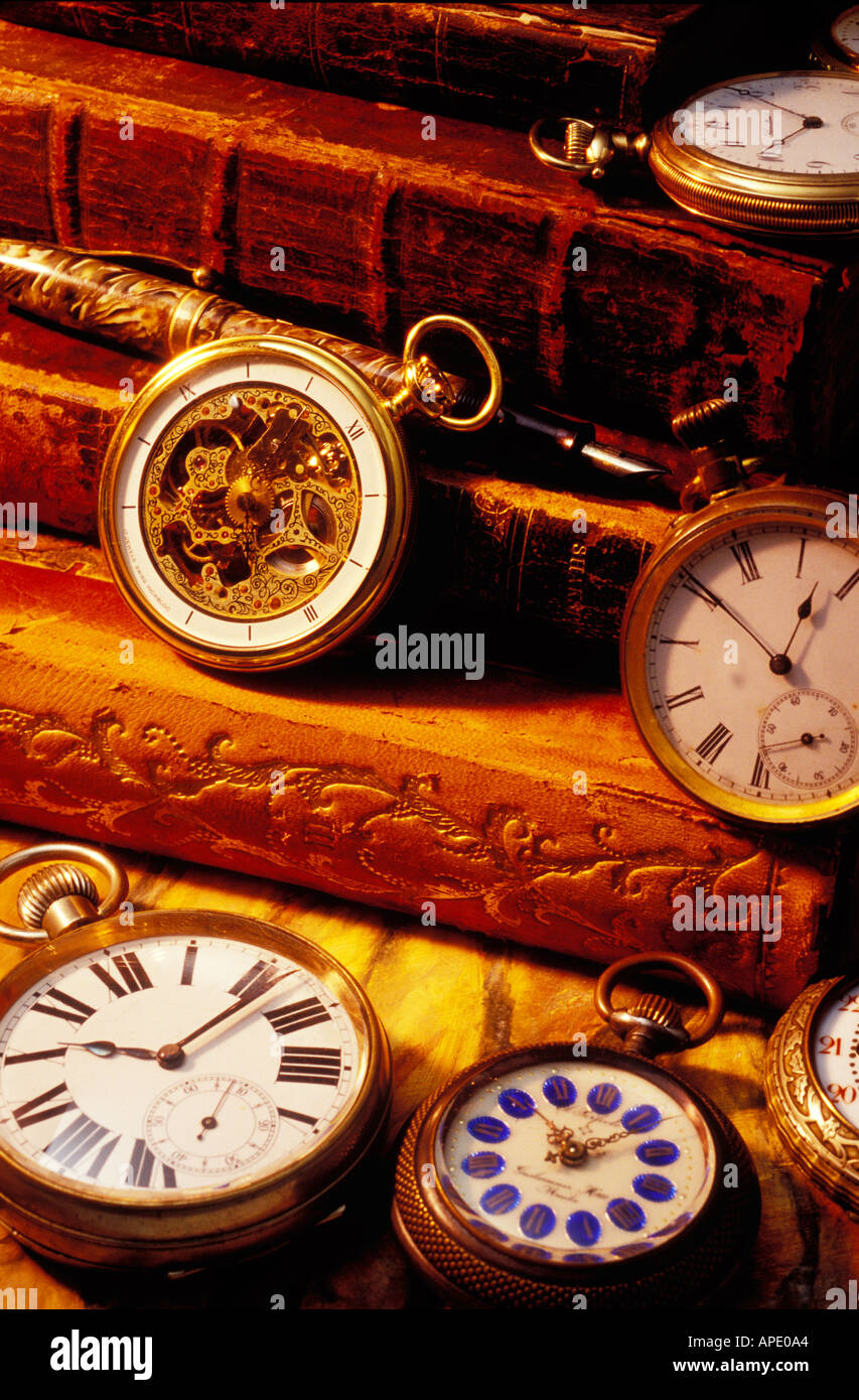 old antique books and pocket watches Stock Photo - Alamy