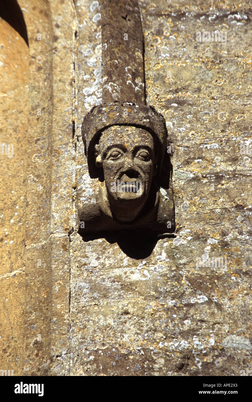 Carved stone face on the side of Cornwell church Gloucestershire The ...