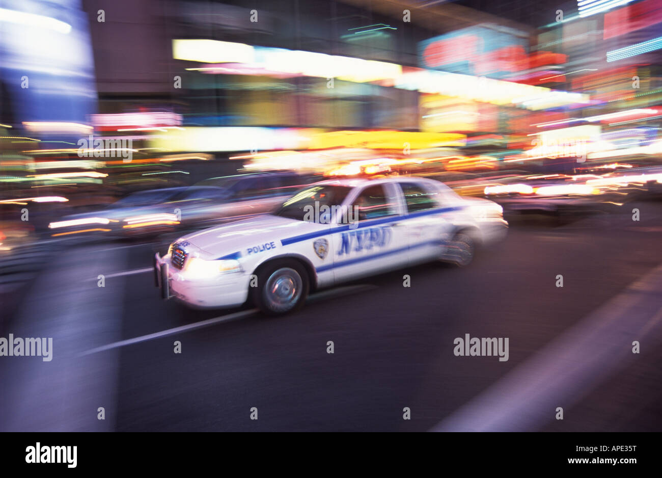 Police car driving through New York streets Stock Photo - Alamy
