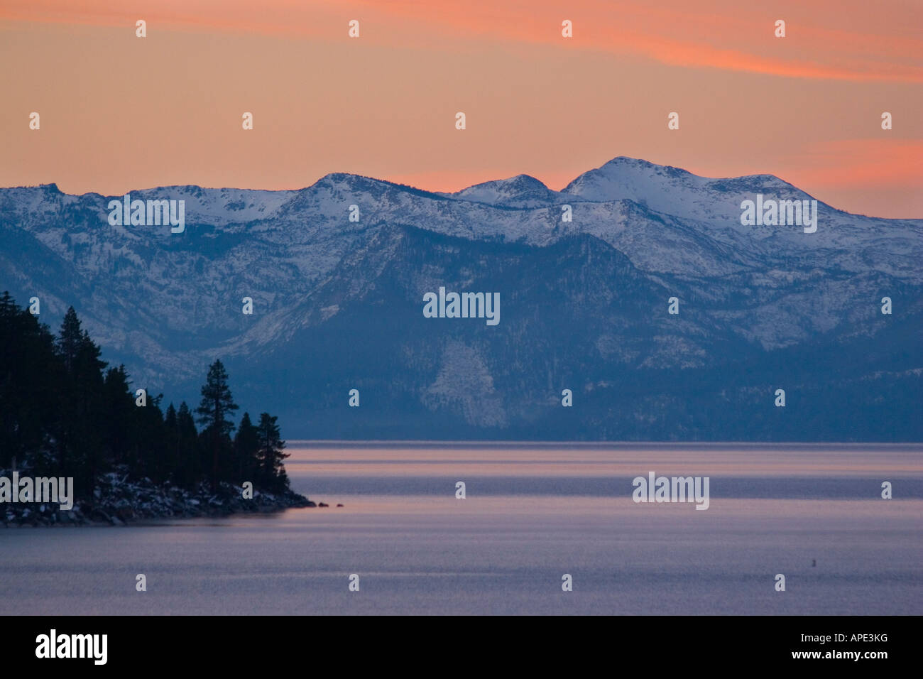 LakeTahoe at sunrise in winter with alpenglow in California Stock Photo ...