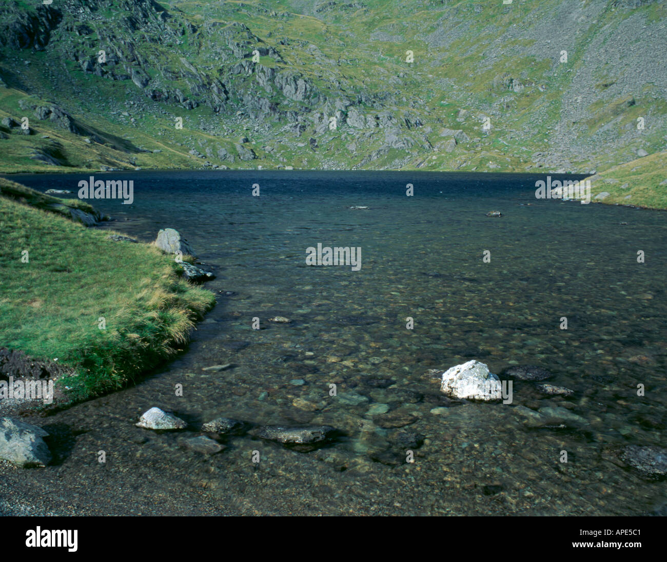 View over Blea Water a classic Lakeland tarn, above Haweswater, Lake District National Park ...