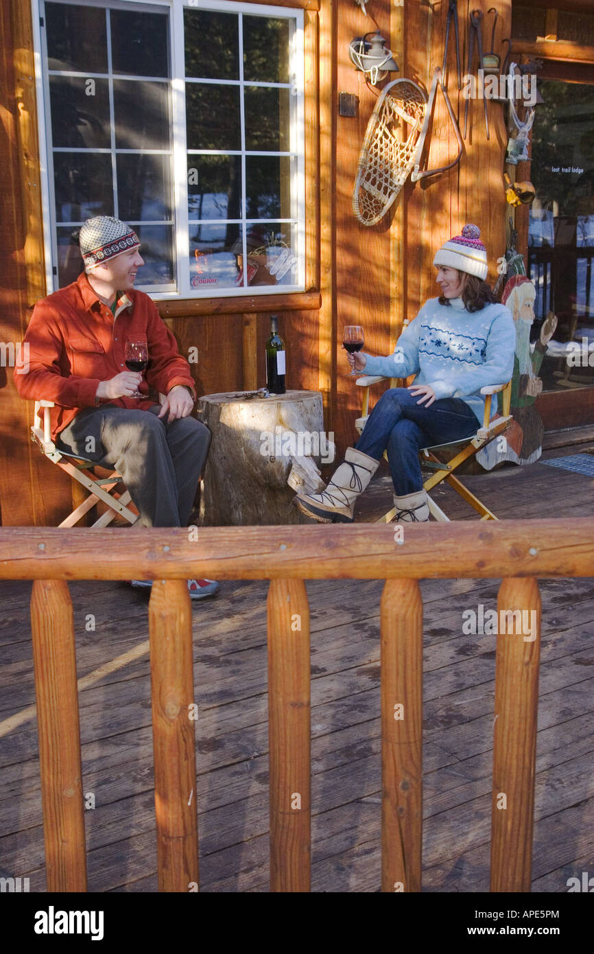 Woman relaxing on ski lodge hi-res stock photography and images - Alamy