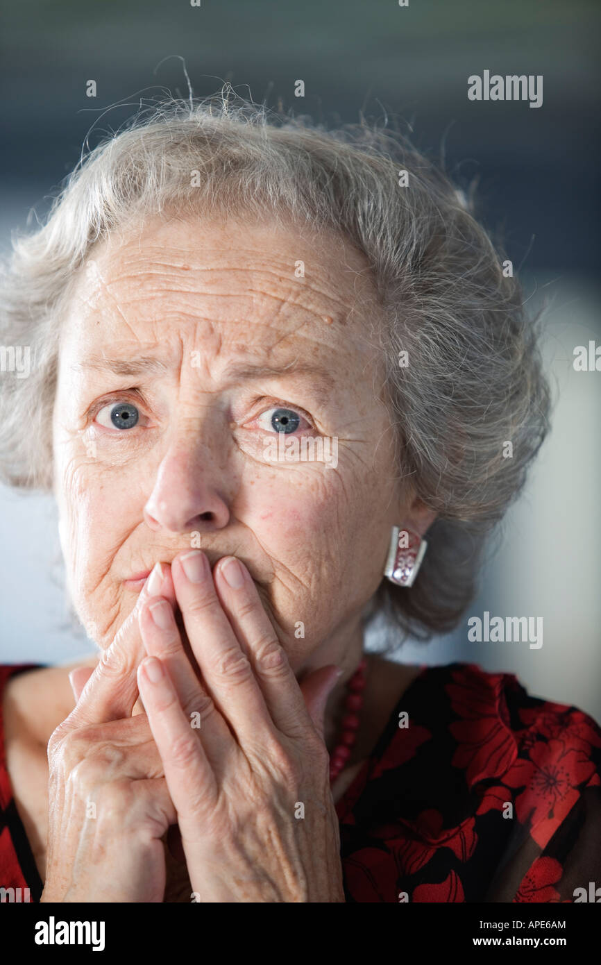 Portrait of a shocked senior woman Stock Photo - Alamy
