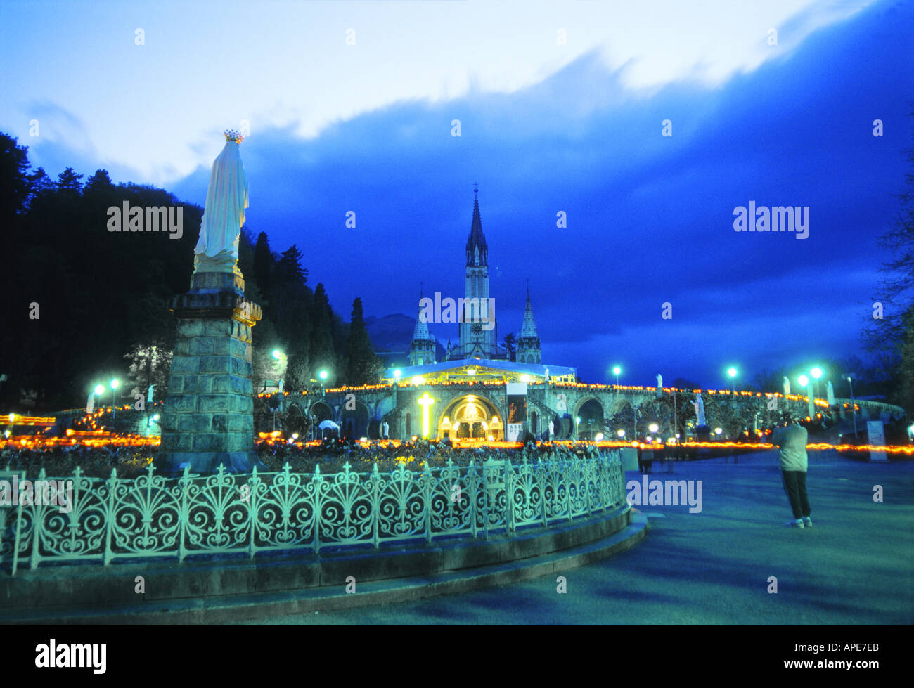 France Pyrenees Lourdes pilgrims candlelight procession to Mass Stock ...