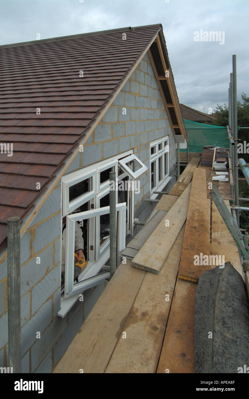 UPVC windows being fitted to new detached house under construction ...
