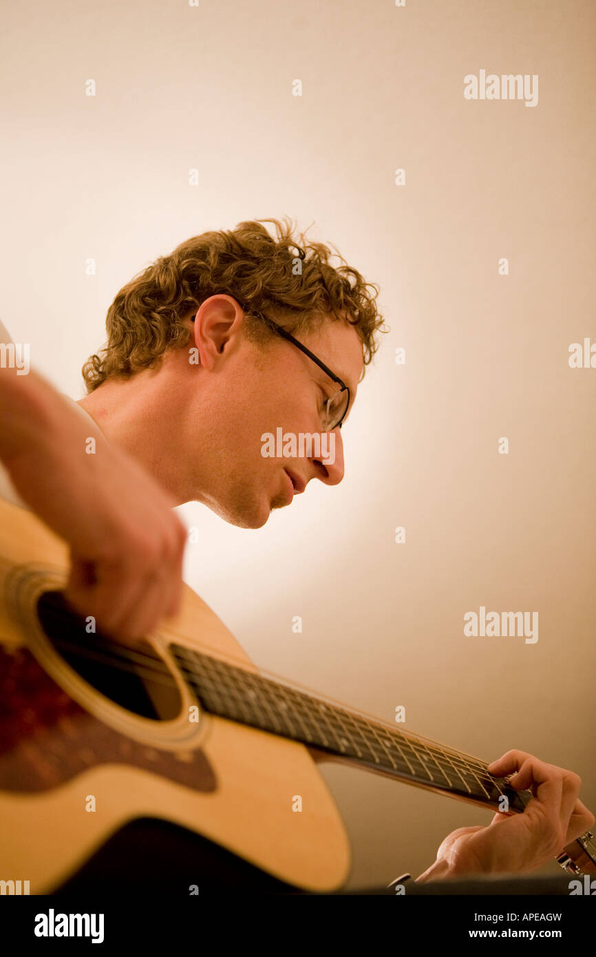 A man plays a guitar Stock Photo - Alamy