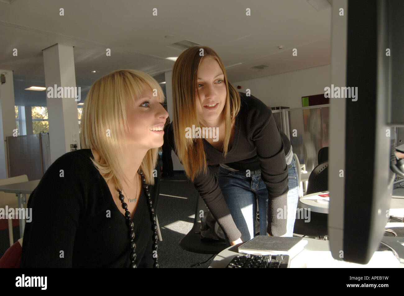 students finishing off an assignment check their work at Brookes ...