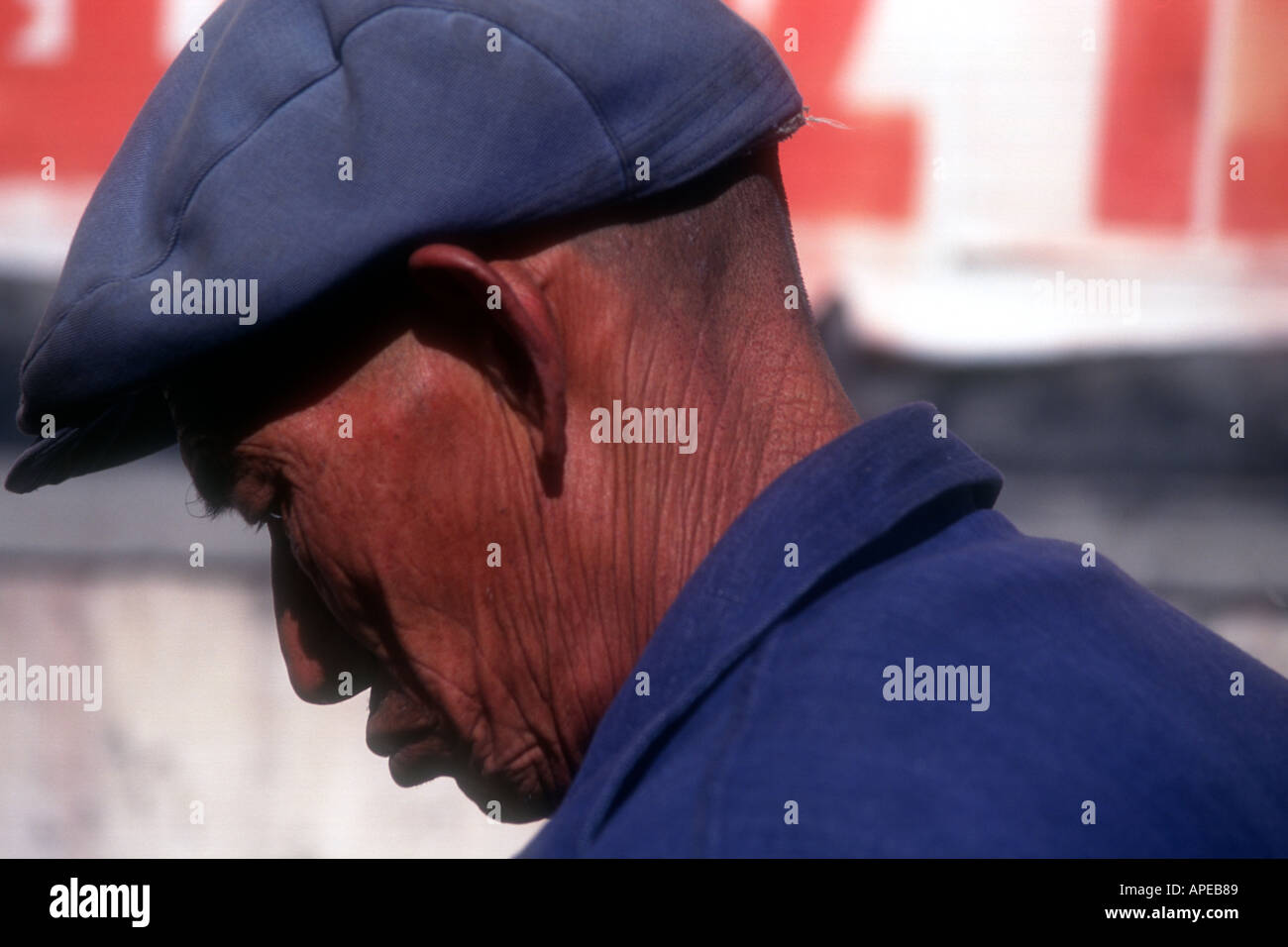 Chinese man in the tradional blue suit Stock Photo - Alamy
