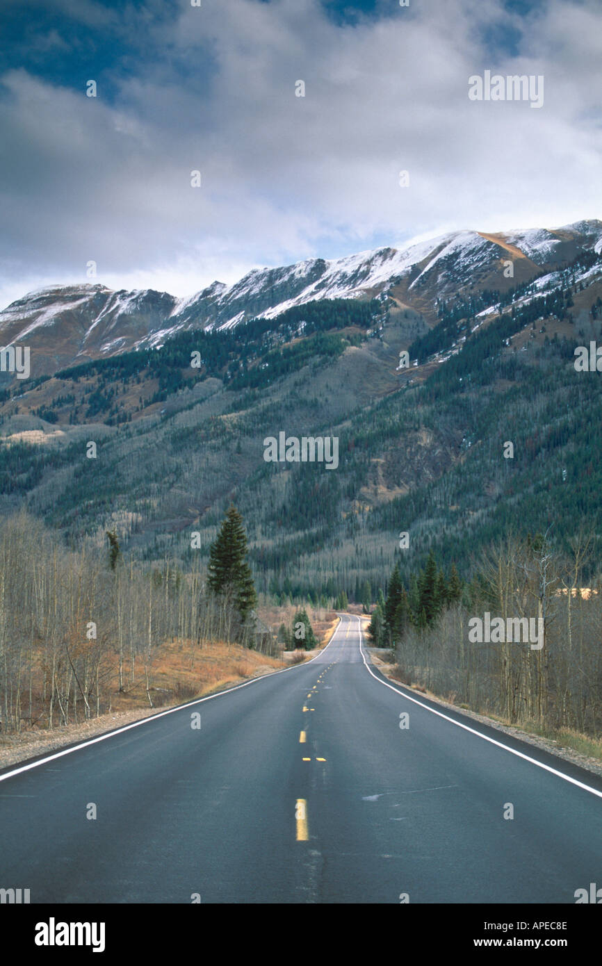 State Route rural Highway 550 through snow topped mountains in late ...