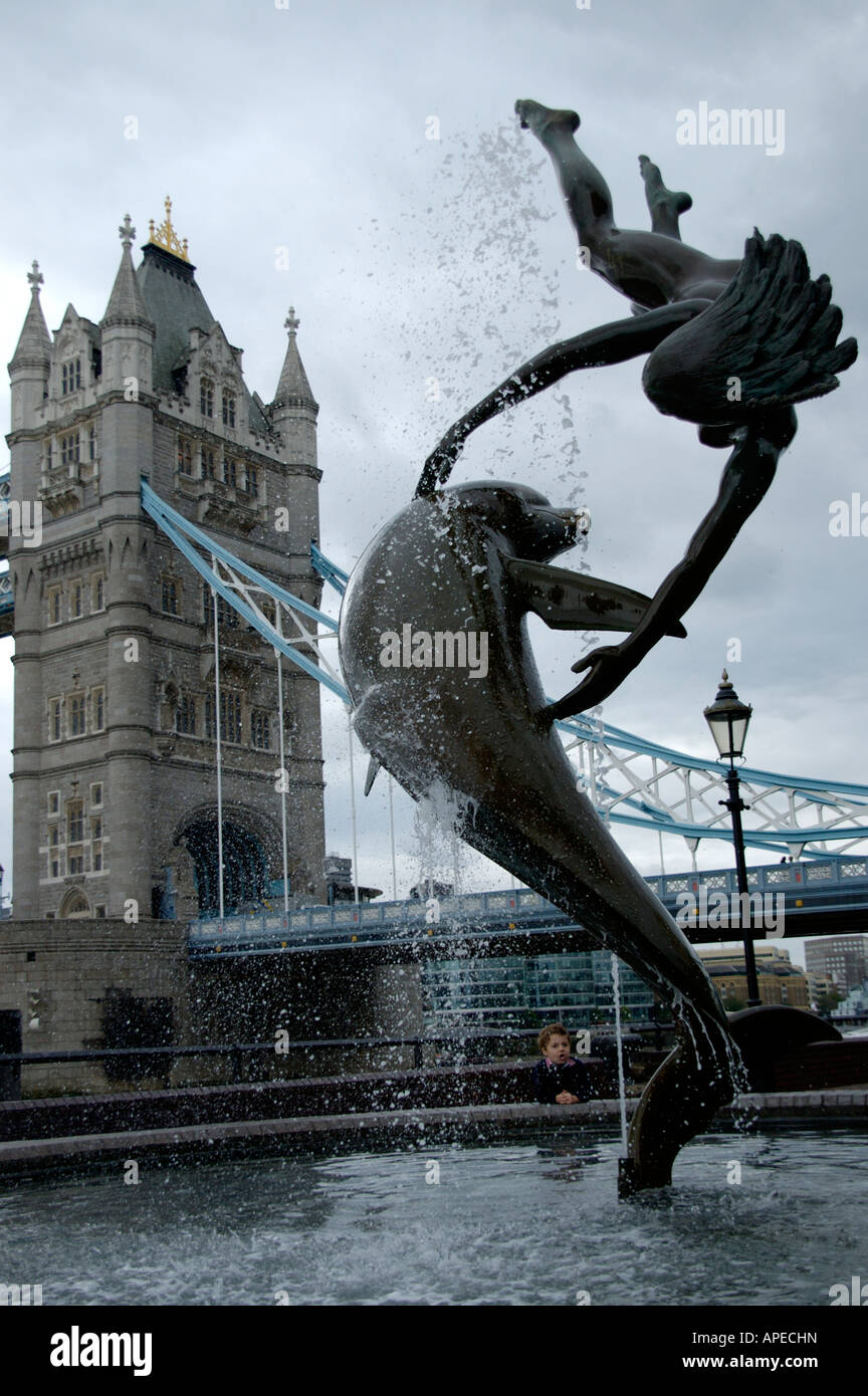 Girl With A Dolphin statue near Tower Bridge, London Stock Photo - Alamy
