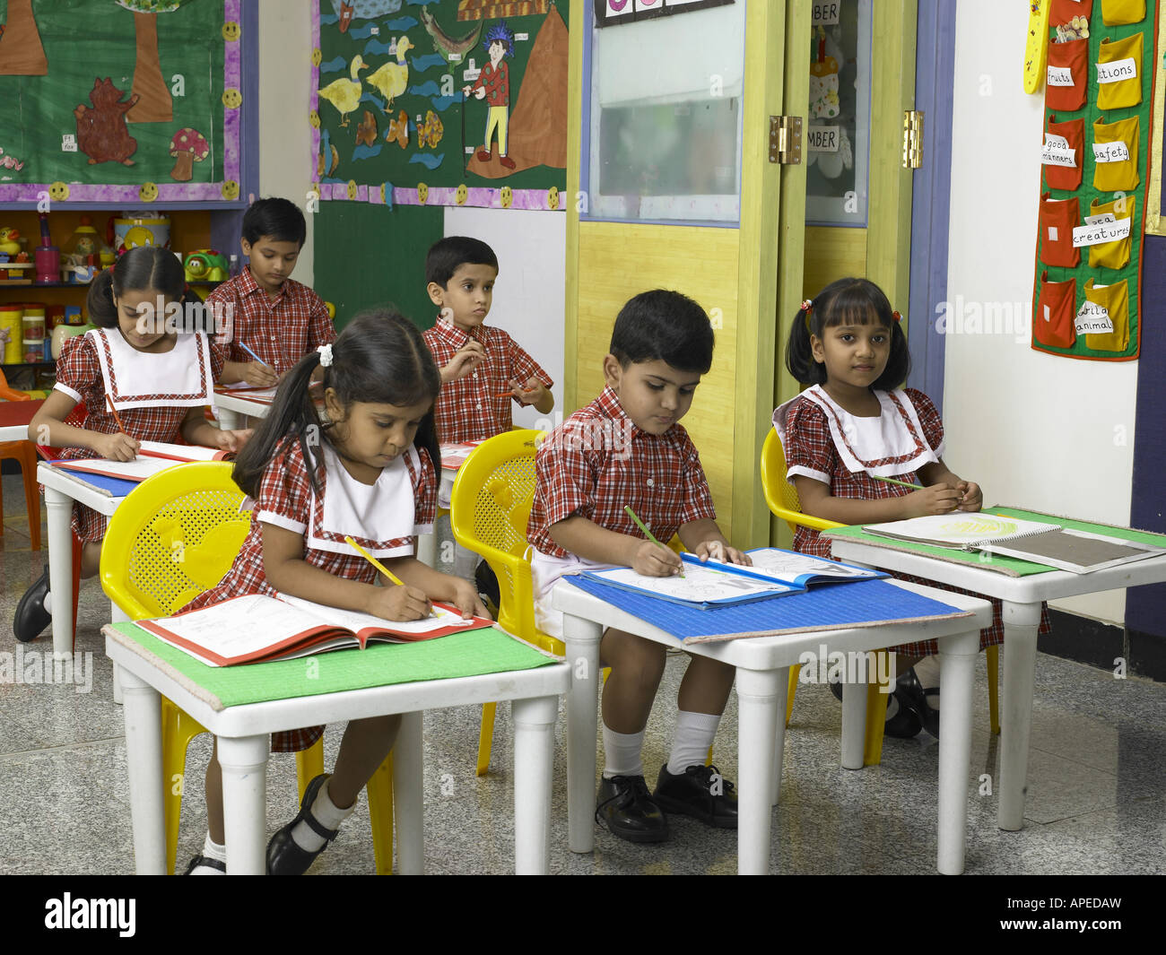South Asian Indian boys and girls studying in nursery school MR Stock ...