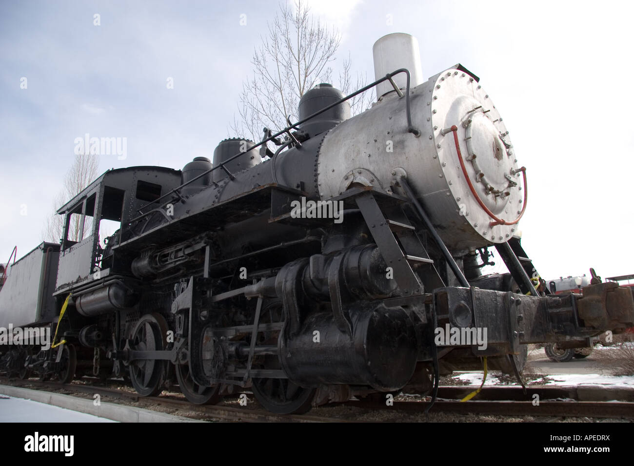 An old steam engine sits on a siding Stock Photo - Alamy