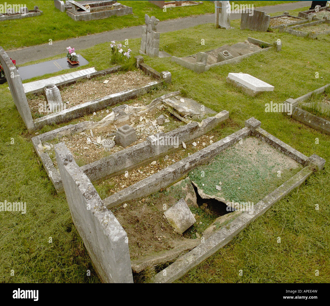 Damaged and neglected graves Stock Photo - Alamy