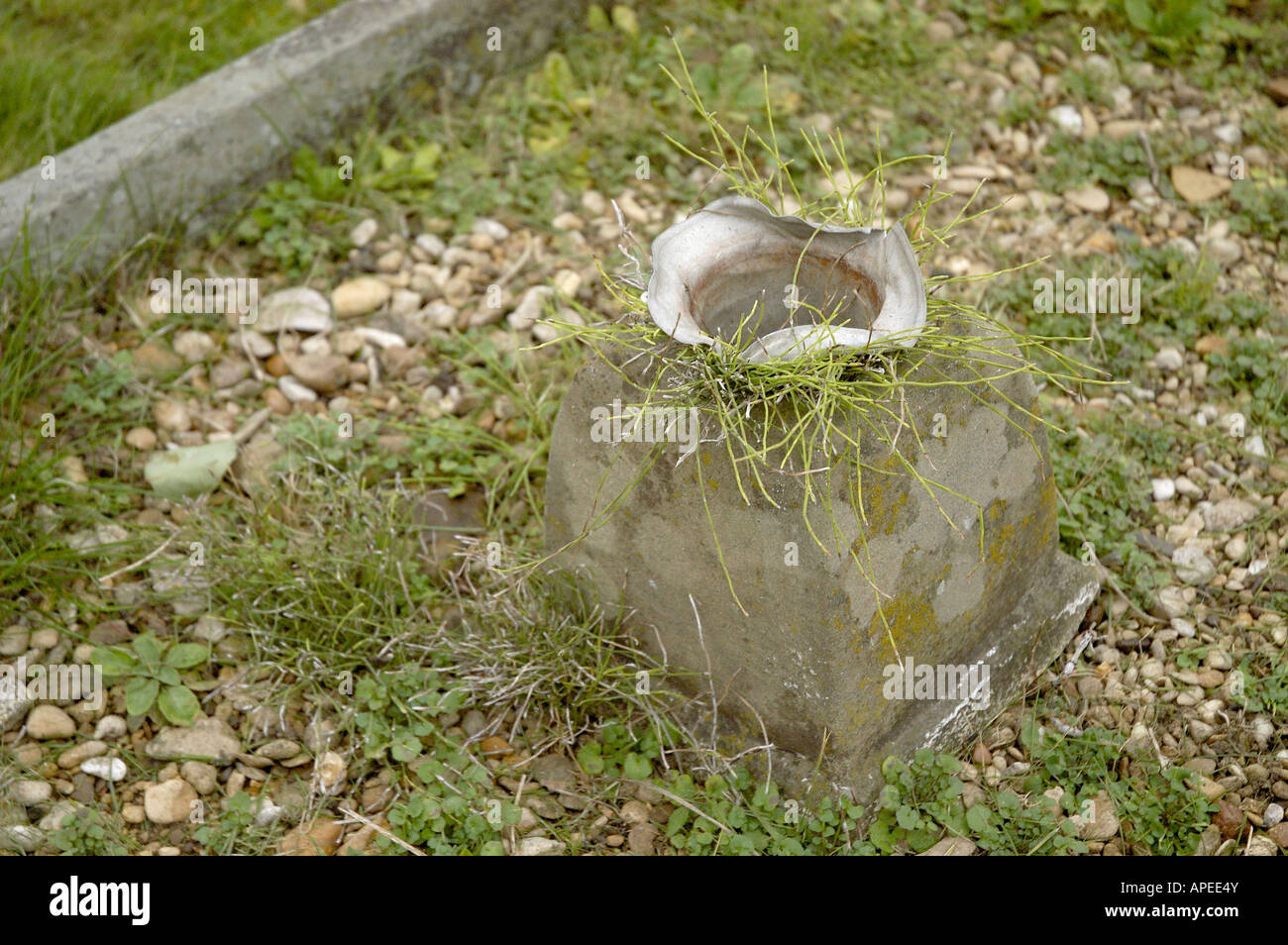 Damaged and neglected grave Stock Photo - Alamy